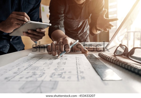 Two Colleagues Discussing Data Working Tablet Stock Photo 453433207 ...