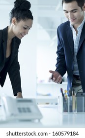 Two Colleagues Talking Looking Document Office Stock Photo 160579184 ...