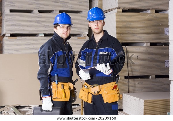 Two Construction Workers Check List Stock Photo (Edit Now) 20209168
