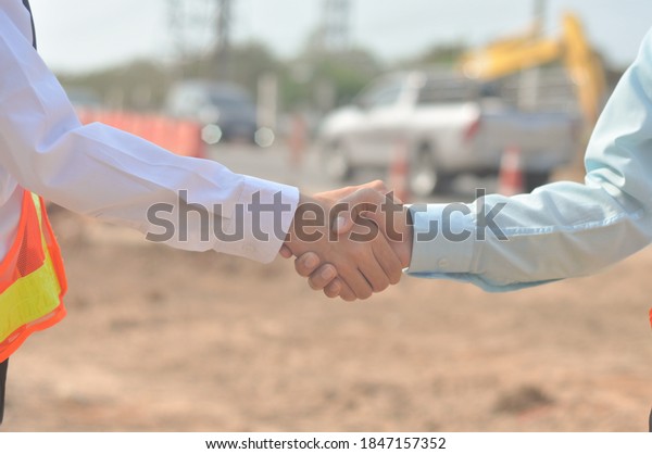 Two Construction Workers Hold Hands Work Stock Photo 1847157352 ...
