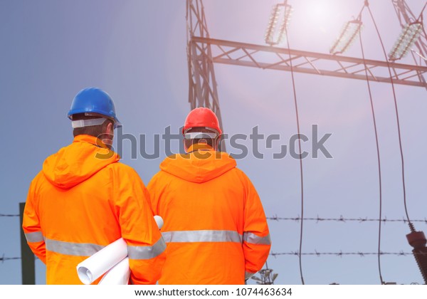 Two Electrical Engineers Substation Back View Stock Photo 1074463634 ...