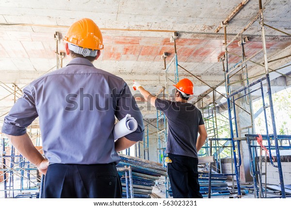 Two Engineer Checking Construction Site Stock Photo (Edit Now) 563023231