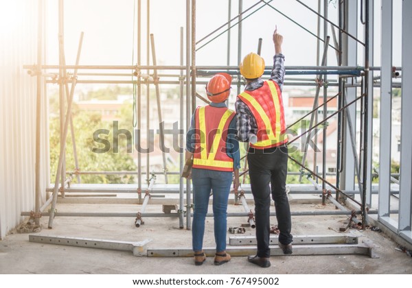 Two Engineer Discussion On Construction Site Stock Photo 767495002 ...