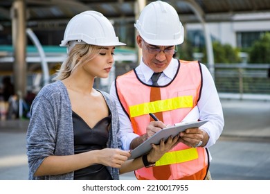 Two Engineers Check Work Through Checklist Stock Photo 2210017955 ...
