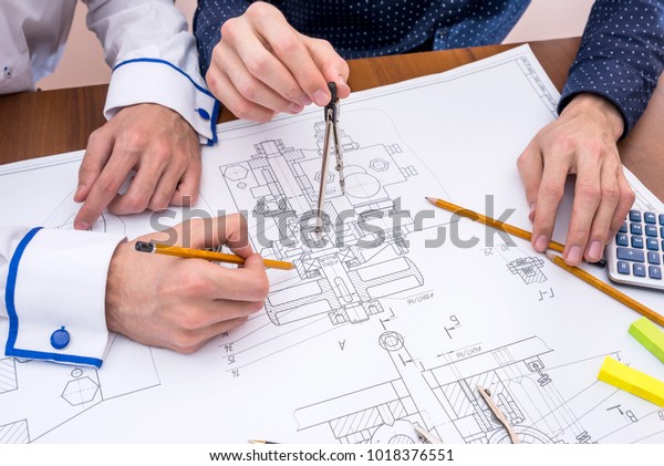 Two Engineers Discussing Engineering Drawing Office Stock Photo (Edit ...