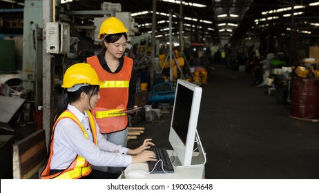 Two Factory Workers Technicians Using Computer Stock Photo 1900324648 ...