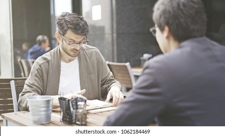 Two Friends Having Conversation Table Cafe Stock Photo 1062184469 ...