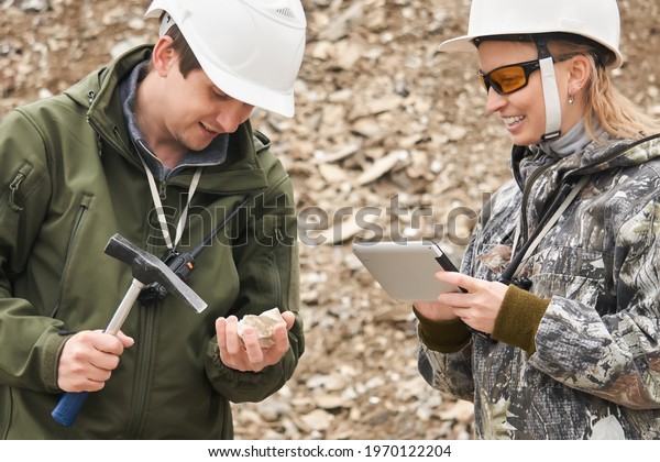 Two Geologists Examining Found Sample Mineral Stock Photo (Edit Now ...