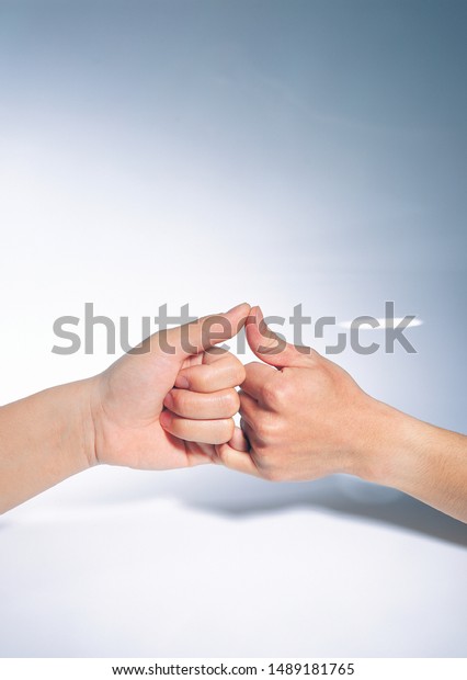 Two Hands Fist Bumping While Touching Stock Photo 1489181765 | Shutterstock
