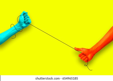 Two Hands Pulling Wire Against Each Stock Photo (Edit Now) 654965185
