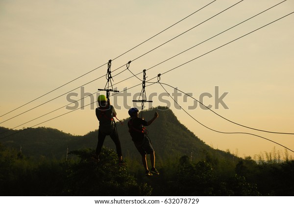 Two Man Jumping Off Tower Hanging Stock Photo 632078729 | Shutterstock