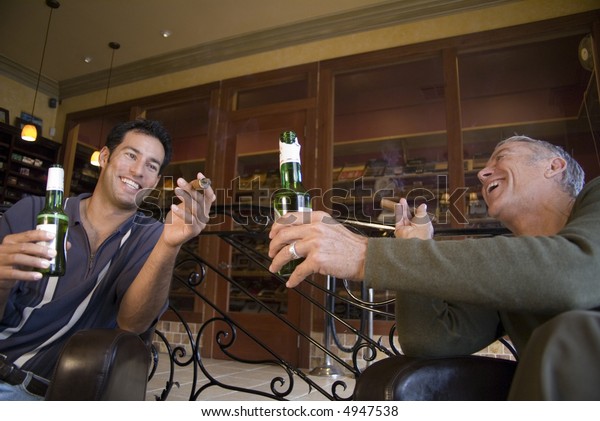 Two Men Smoking Cigars Drinking Beer Stock Photo 4947538 | Shutterstock
