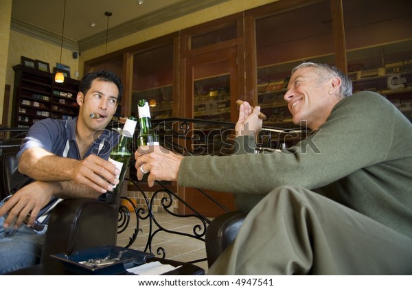 Two Men Smoking Cigars Drinking Beer Stock Photo 4947541 | Shutterstock