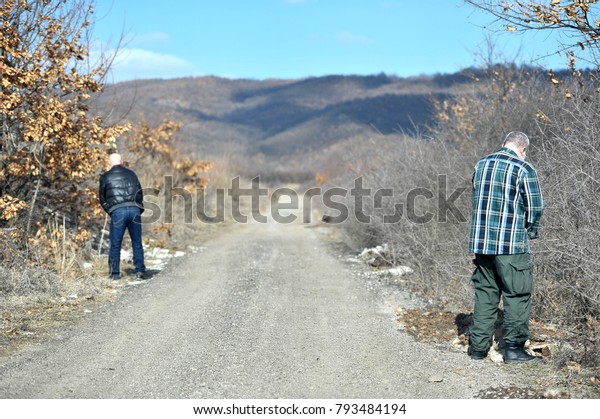 Two Men Urinating Stock Photo 793484194 | Shutterstock