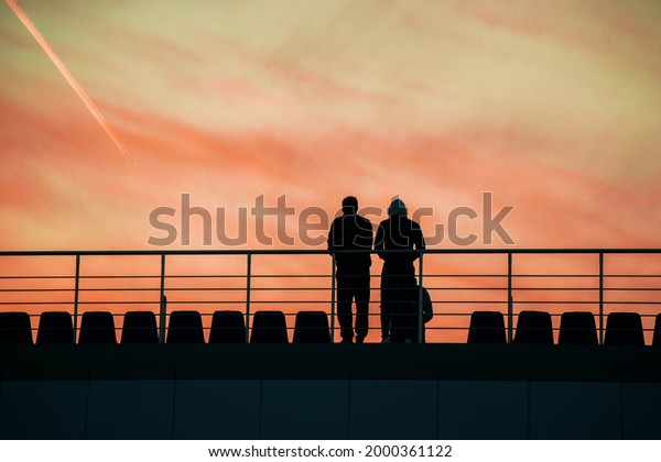 Two Men Watching Sunset Stock Photo 2000361122 | Shutterstock