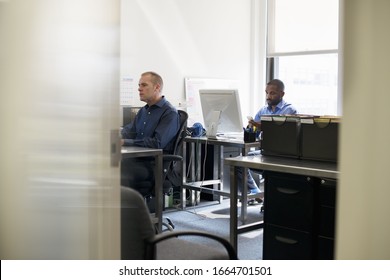 Two Men Working Office Using Computers Stock Photo 1664701501 ...