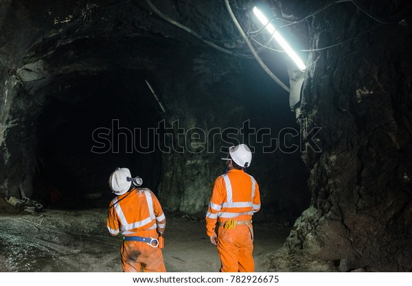 Two Miners Observing Cavern Stock Photo (Edit Now) 782926675