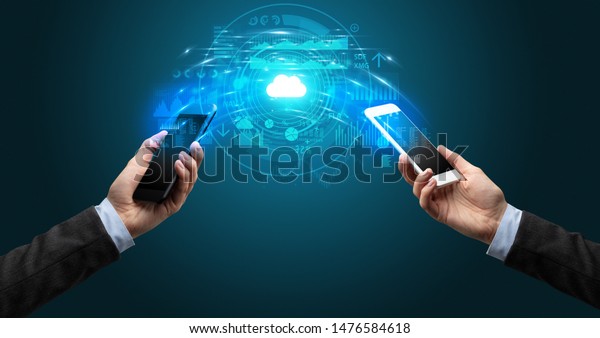 Two Mobile Phones Syncing Through Cloud : photo de stock (modifiable ...
