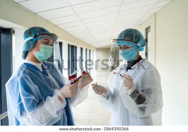 Two Nurses Work Blood Samples Determine Stock Photo 1864390366 ...