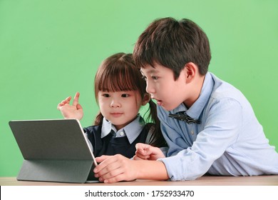 Two Pals Use Tablet Computers Stock Photo (Edit Now) 1752933521