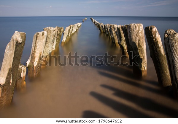 Two Parallel Rows Wooden Pillars Like Stock Photo 1798647652 | Shutterstock