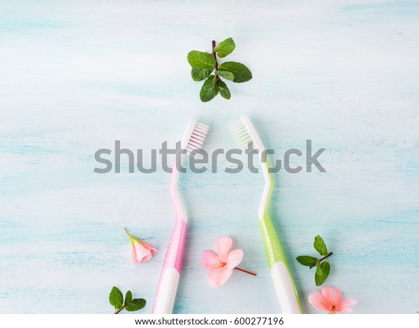 Two Pastel Toothbrushes Pink Flowers Mint Stock Photo (Edit Now) 600277196 Two Pastel Toothbrushes Pink Flowers Mint Stock Photo (Edit Now) 600277196