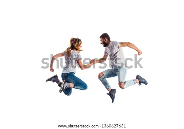 Foto de stock sobre Two People Having Fun While Jumping (editar ahora ...