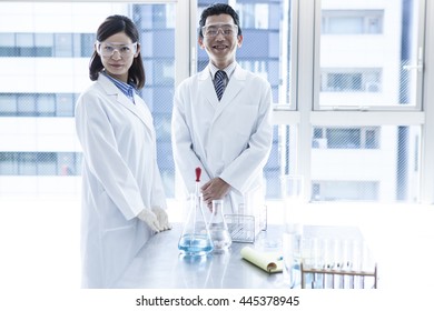 Two Scientists Stand By Window Stock Photo (Edit Now) 445379014