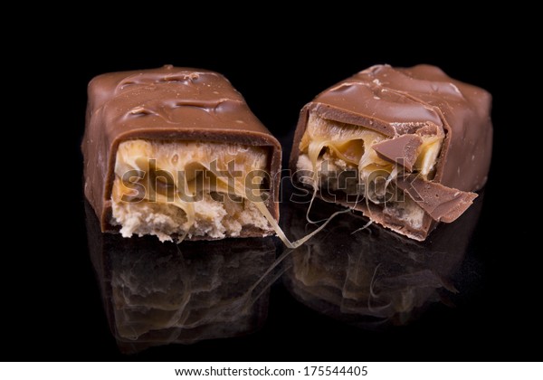 Two Slices Snickers Bars On Black Lagerfotos (rediger nu) 175544405