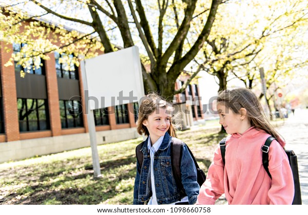 Two Students Outside School Standing Together Stock Photo 1098660758 ...