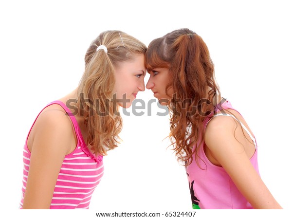 Two Teenage Sisters Staring Each Other Foto de stock 65324407 ... Two Teenage Sisters Staring Each Other Foto de stock 65324407 ...