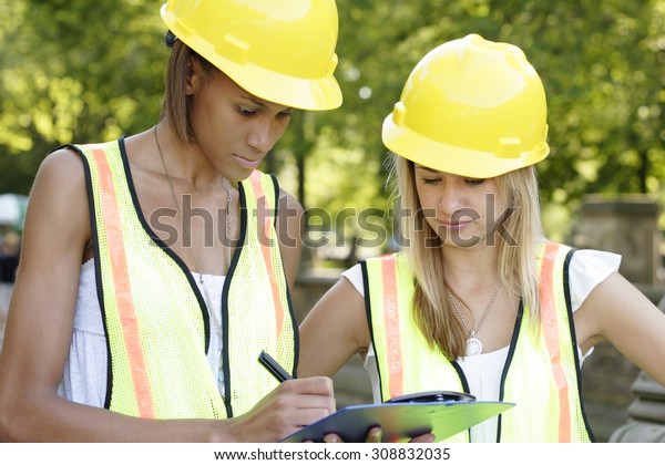 Two Utility Workers Clipboard Stock Photo 308832035 | Shutterstock