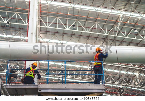 Two Workers Installing Piping System Fabrication Stock Photo 1490563724 ...