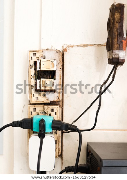 Unsafe Electrical Outlet Plugs Stock Photo 1663129534 | Shutterstock