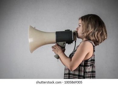 Little Girl Talking Into Megaphone Stock Photo (Edit Now) 1262033977