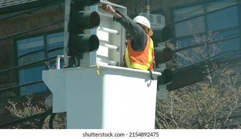 Utility Worker Fixing Traffic Light Outside Stock Photo 2154892475 ...