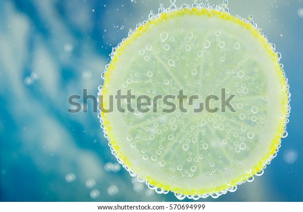 Vertical Closeup Slice Lemon Falling Into Stock Photo 570694999 ...