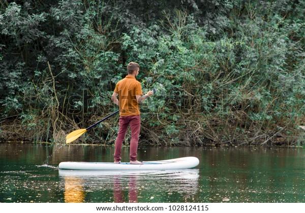 View Back Man On Sup Board Stock Photo 1028124115 | Shutterstock