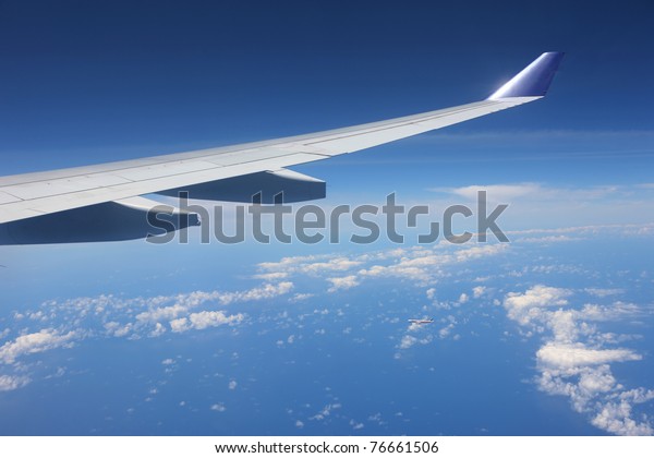View Jet Plane Wing Cloud Patterns Stock Photo (Edit Now) 76661506