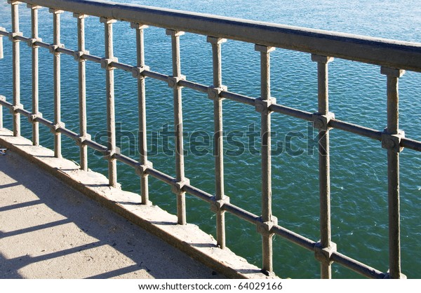 View River Through Bridge Railing Stock Photo (Edit Now) 64029166