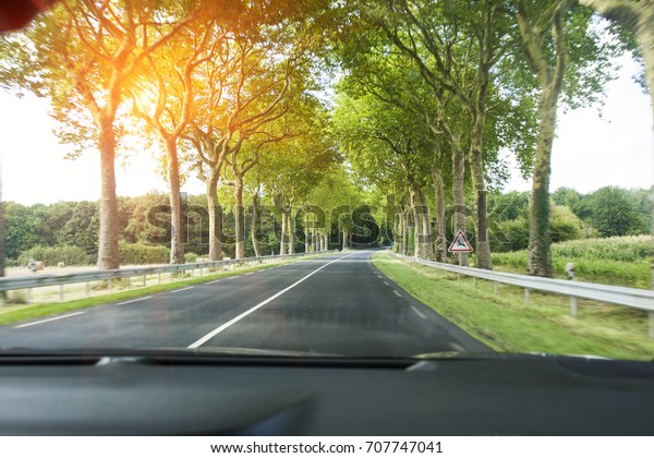 View Road Forest Through Windshield Car Stock Photo (Edit Now) 707747041