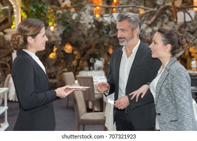 Woman Welcoming Couple Function Foto Stok 653152060 | Shutterstock