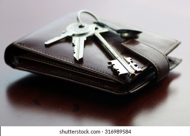 2,403 Wallet and keys on table Images, Stock Photos & Vectors ...