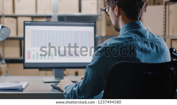 Warehouse Inventory Manager Works Spreadsheet On Stock Photo 1237494580 ...