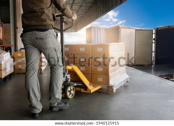 Warehouse Worker Unloading Package Boxes Into Stock Photo 1940125915 ...