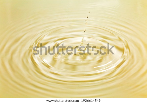 Water Drops Falling On Water Surface Stock Photo (Edit Now) 1926614549