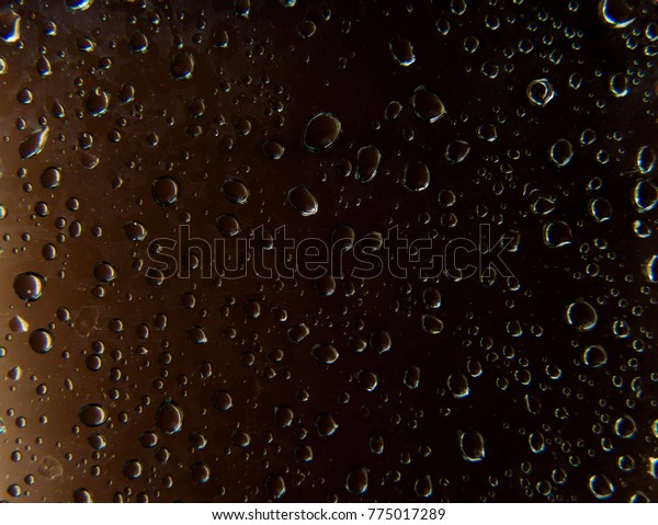 Water Drops Over Dark Surface Close Stock Photo (Edit Now) 775017289