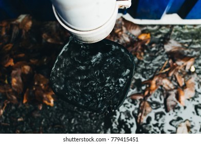 Стоковая фотография 779415451: Water Flows Through Drain Pipe Into ...