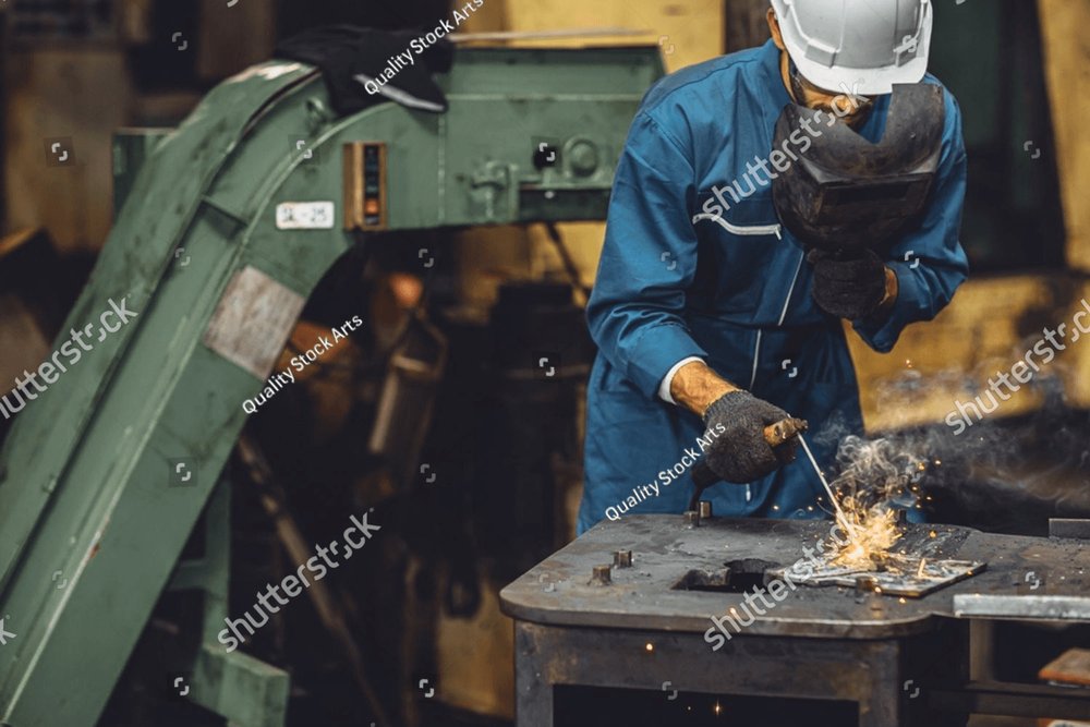 welding worker team working arc weld metal joint production in heavy ...