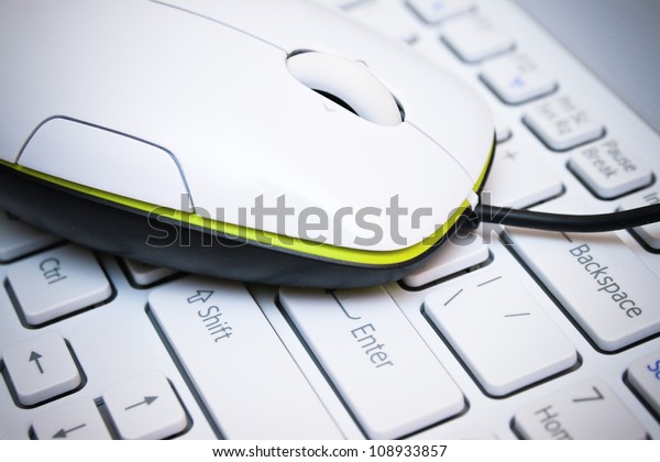 White Computer Mouse On Keyboard Stock Photo (Edit Now) 108933857